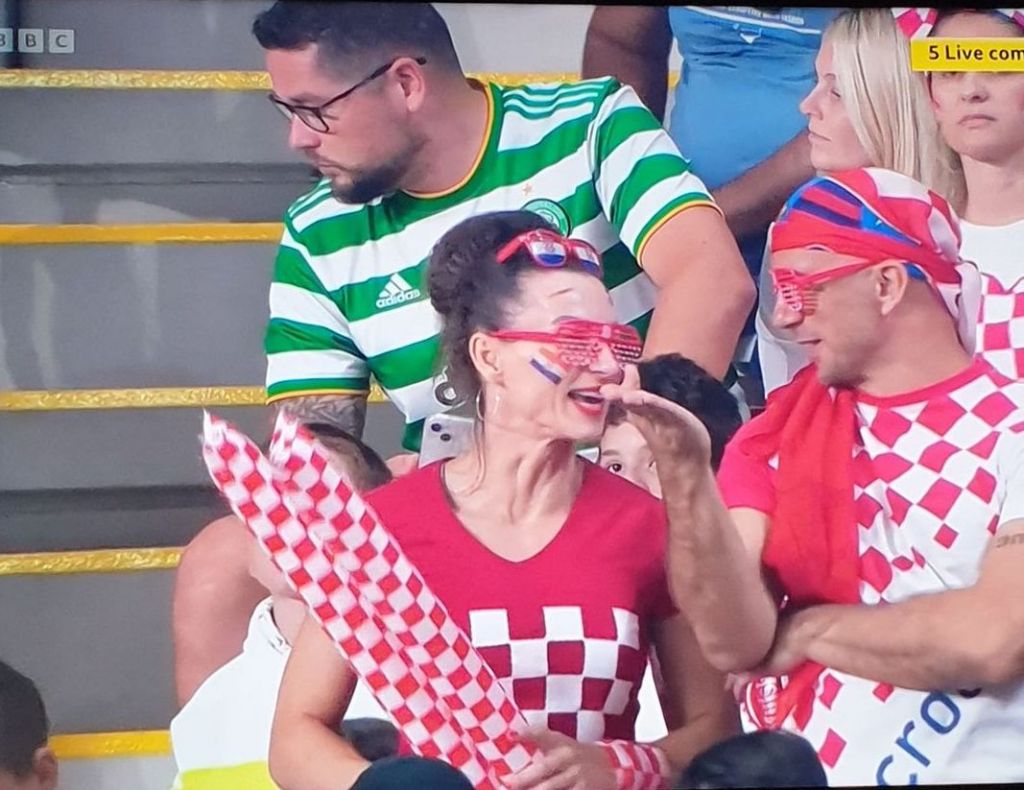 Photo: Split loyalties for Celtic fan in Qatar